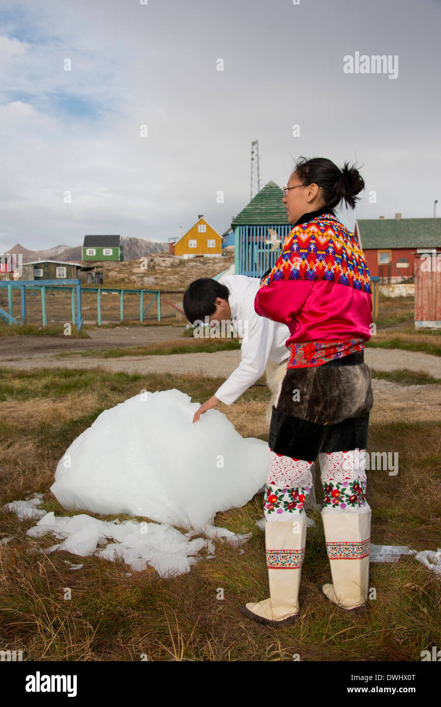 Greenland, Disko Bay, Saqqaq (aka Sarqaq or Solsiden). Couple, in ...