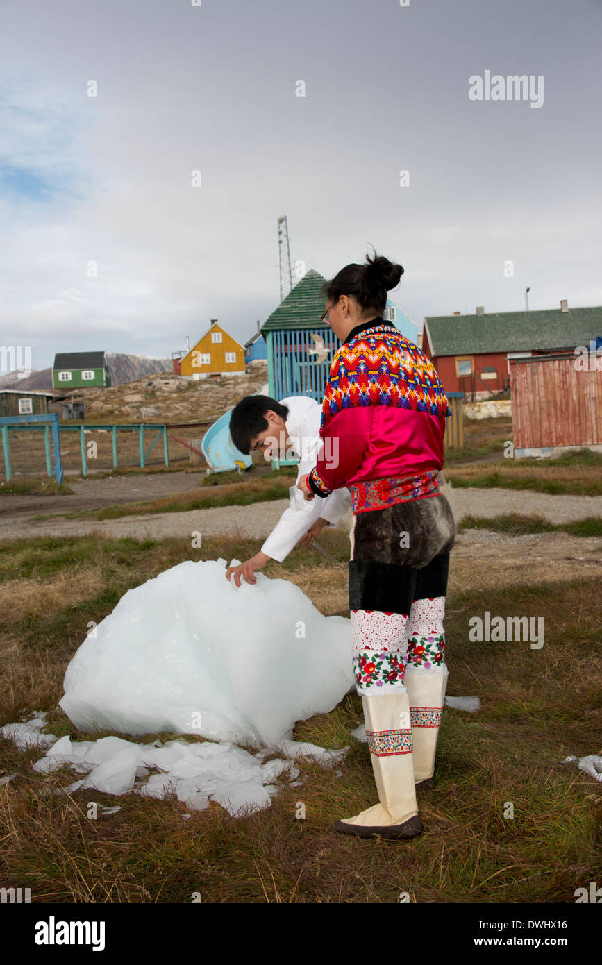 Greenland, Disko Bay, Saqqaq (aka Sarqaq or Solsiden). Couple, in ...