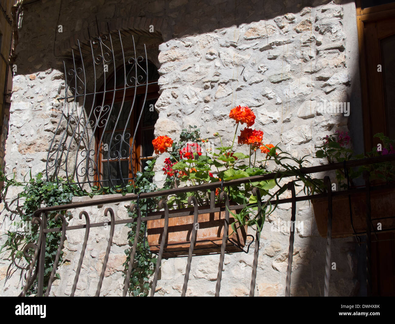 Geraniums on a balcony, France Stock Photo - Alamy