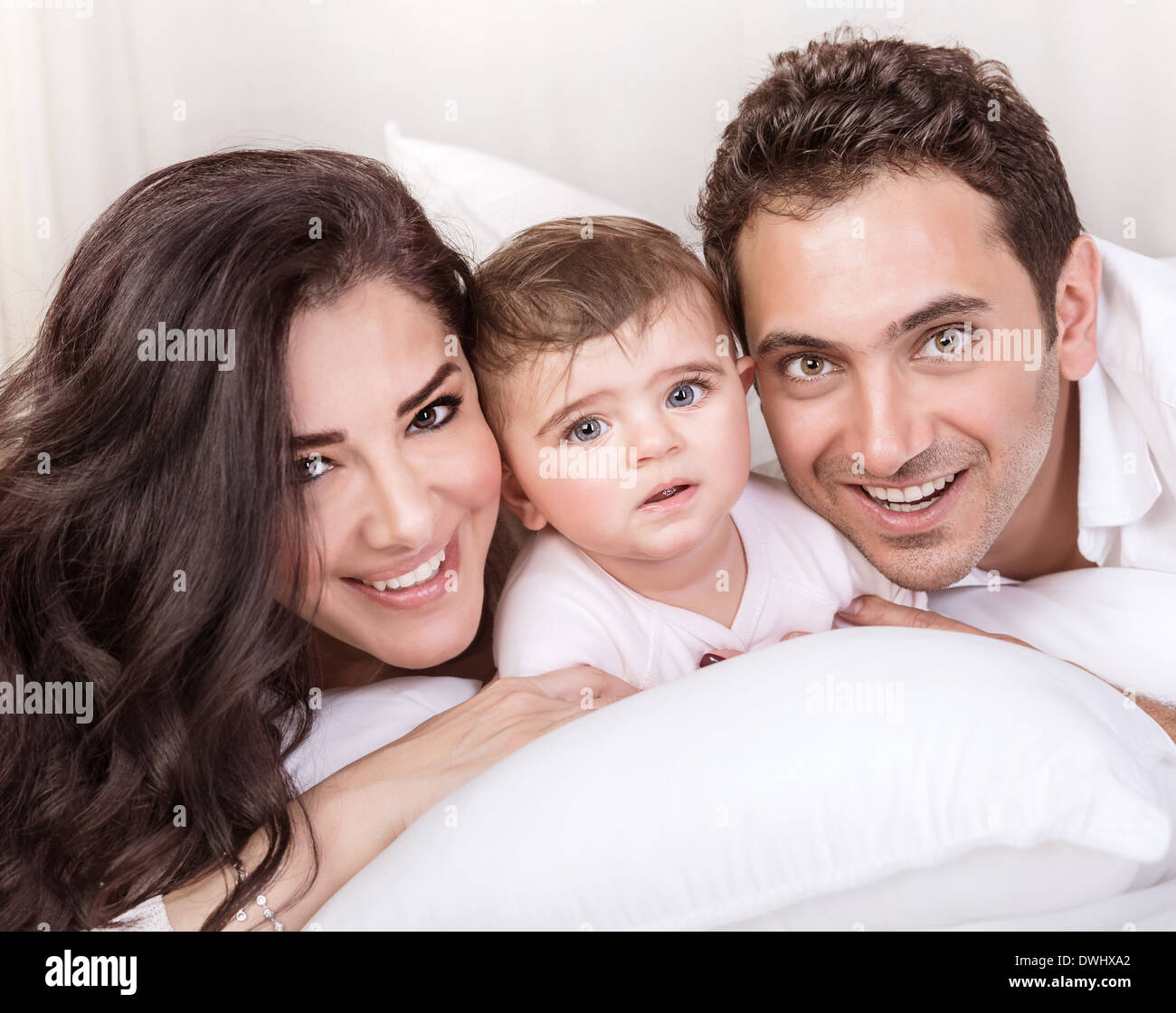 Closeup portrait of happy arabic family, beautiful mother and handsome ...