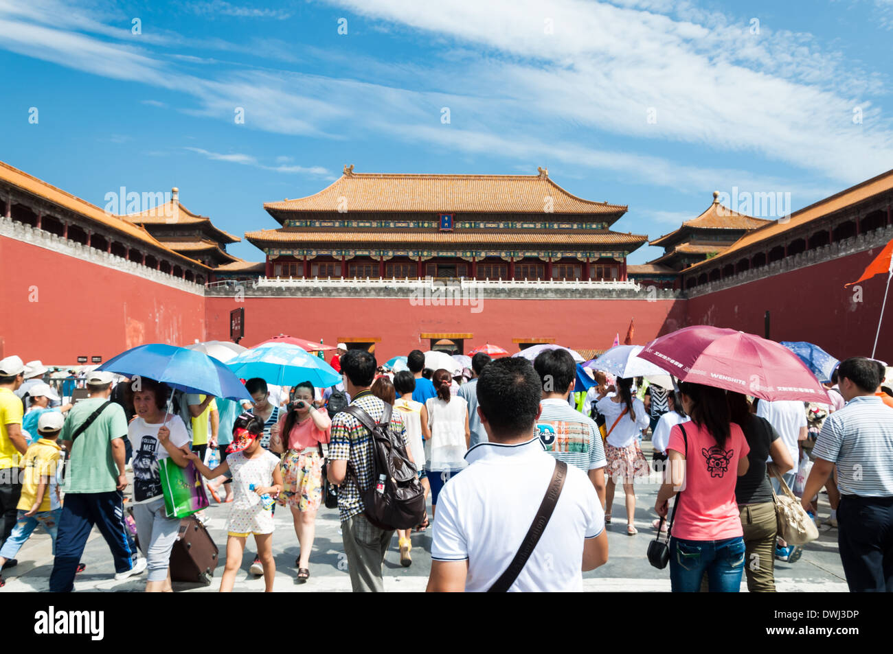 Tourists enter through the Meridian Gate into the Forbidden City in ...