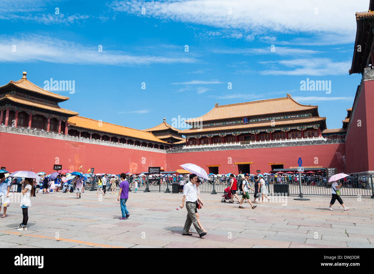 Tourists enter through the Meridian Gate into the Forbidden City in ...