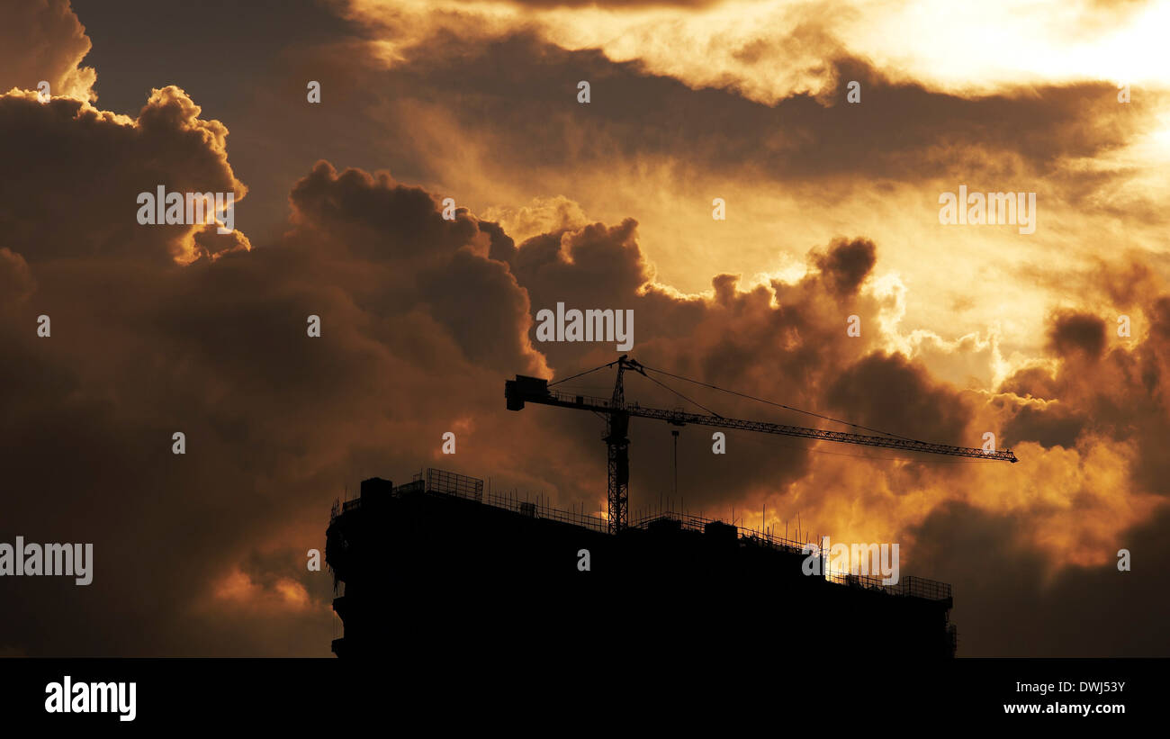 Building in construction against spectacular sky Stock Photo - Alamy