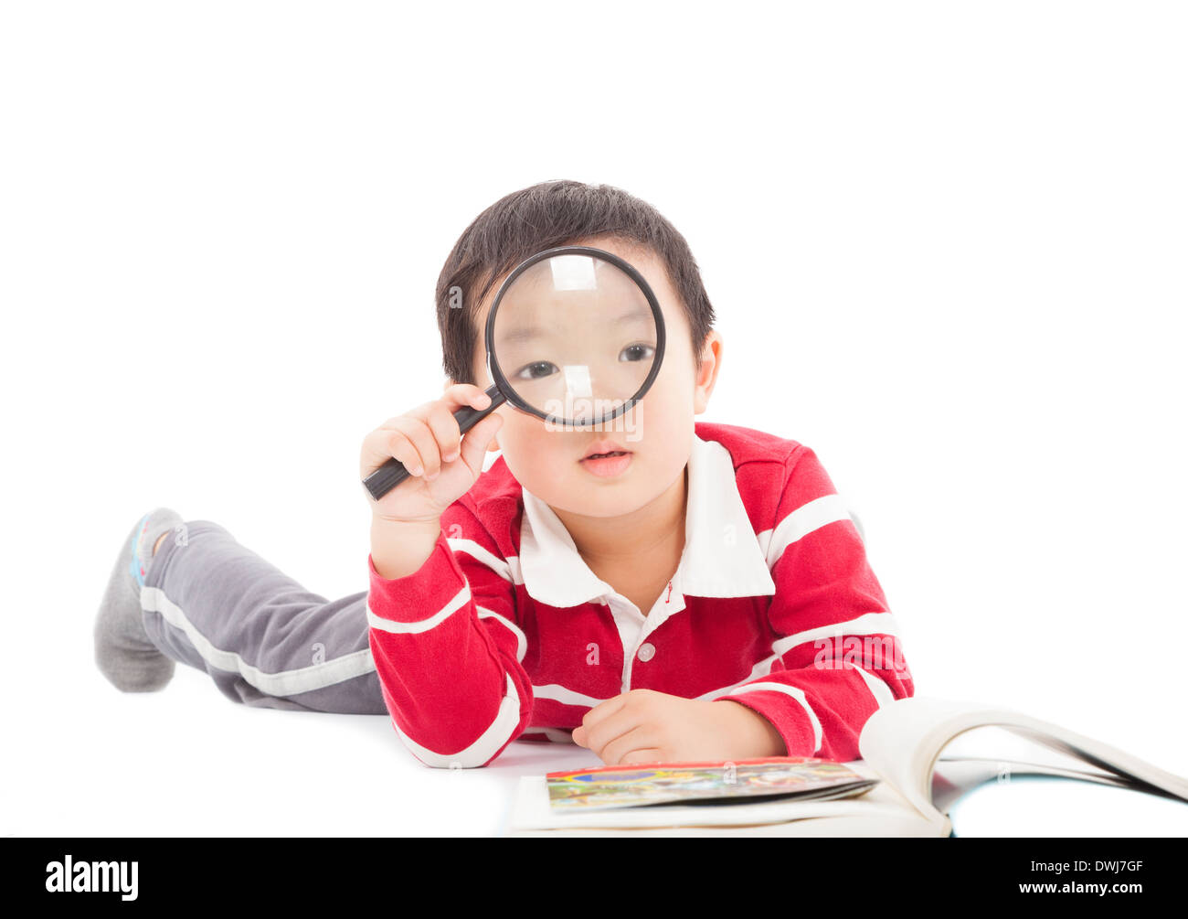 happy kid is holding magnifying glass to explore over white Stock Photo ...