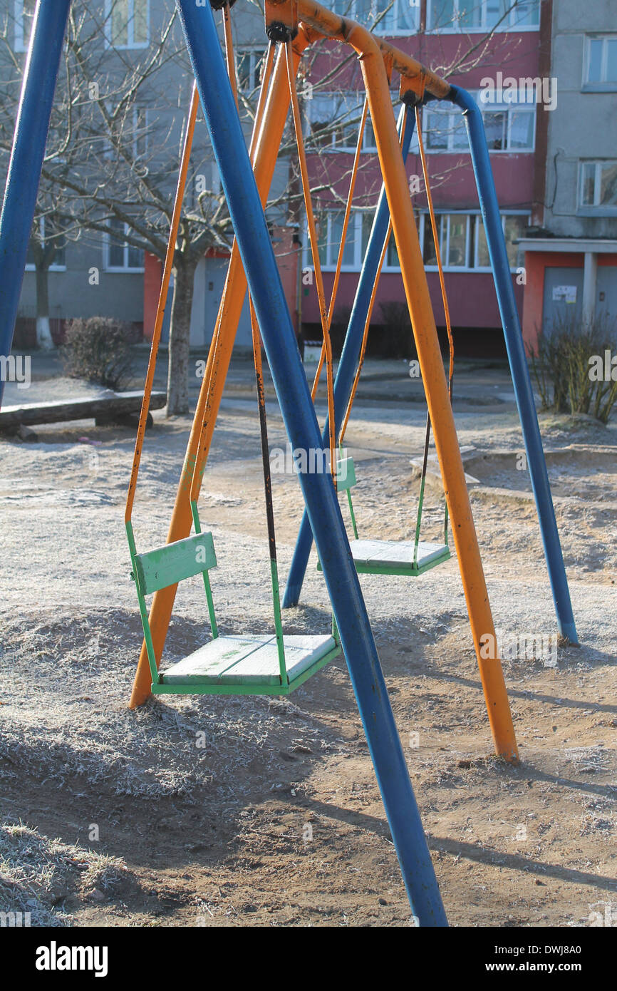 fast lightly colorful swing in the yard Stock Photo - Alamy