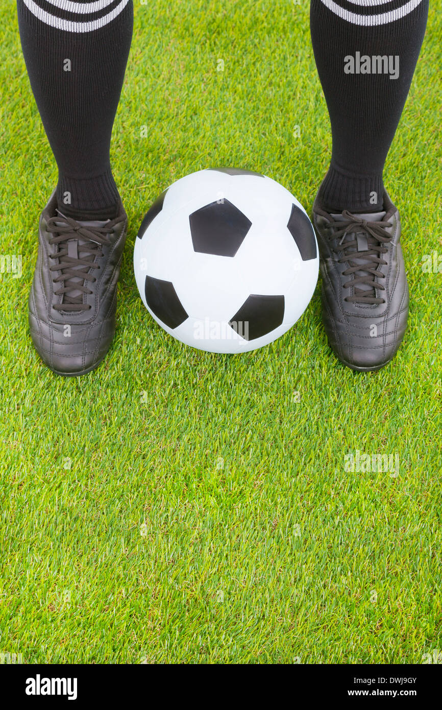 Soccer football player standing feet hi-res stock photography and ...
