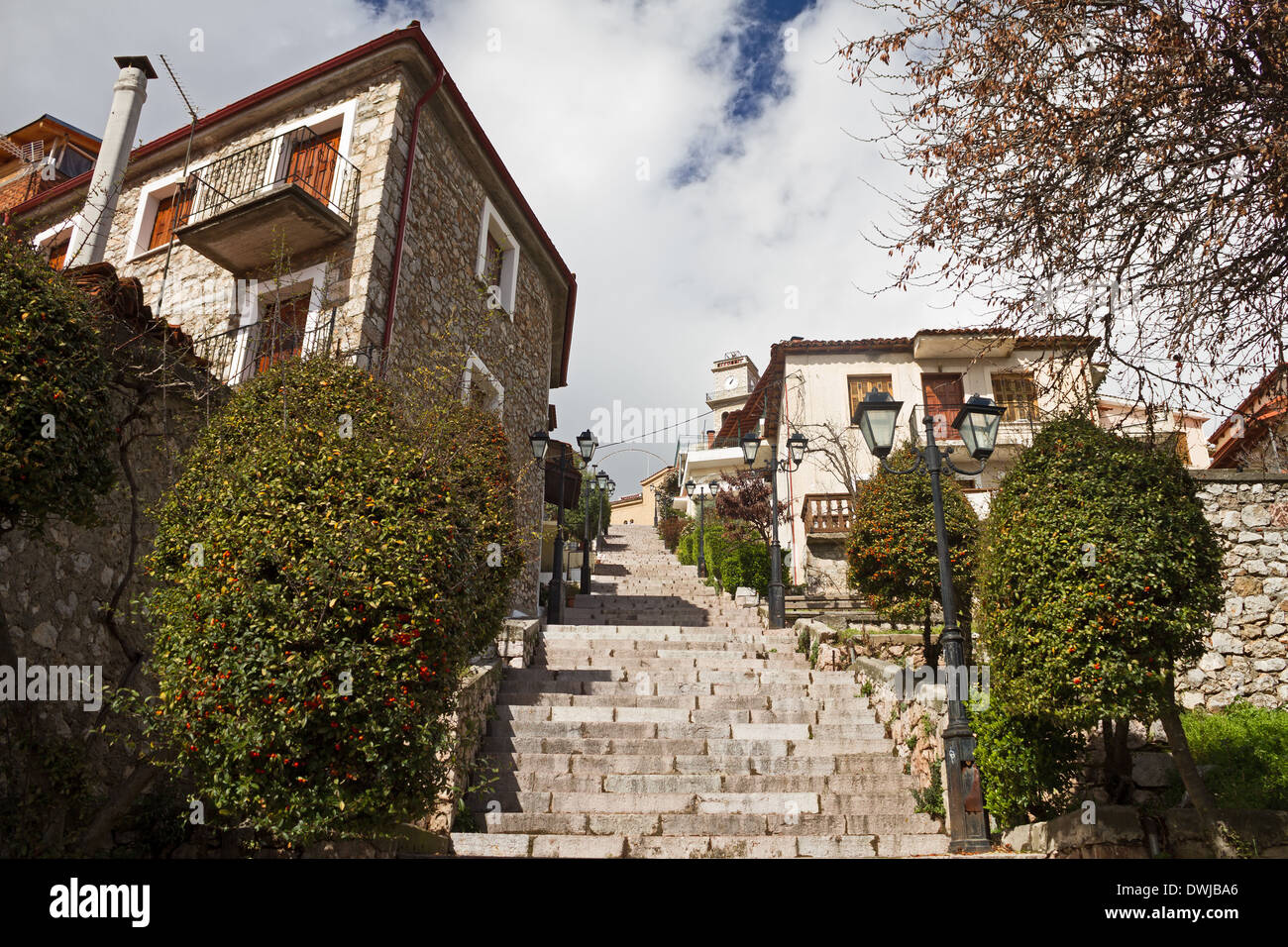 Stone steps ascending in an alley of the Greek mountain resort town of ...
