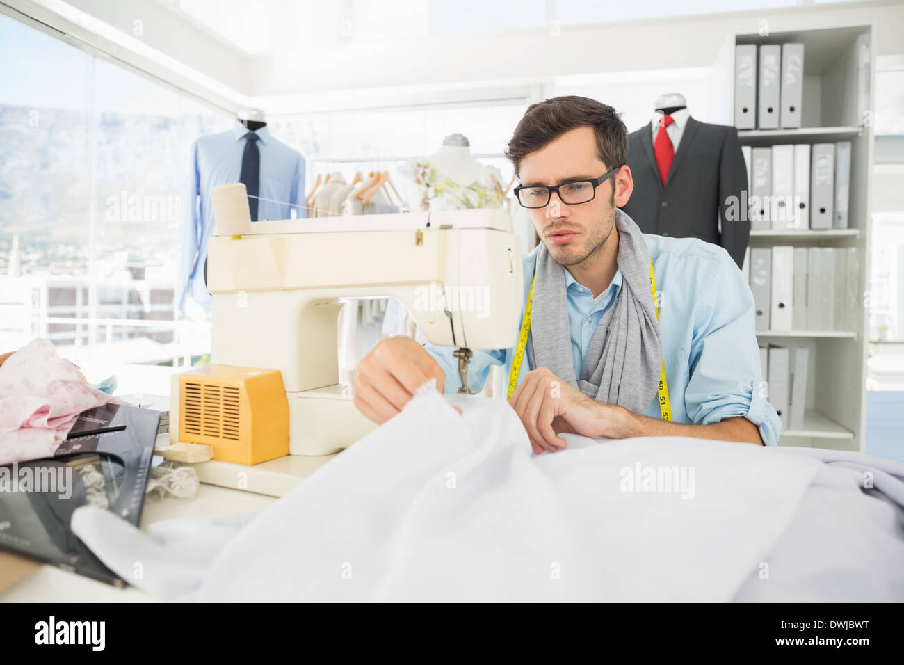 Male sewing hi-res stock photography and images - Alamy