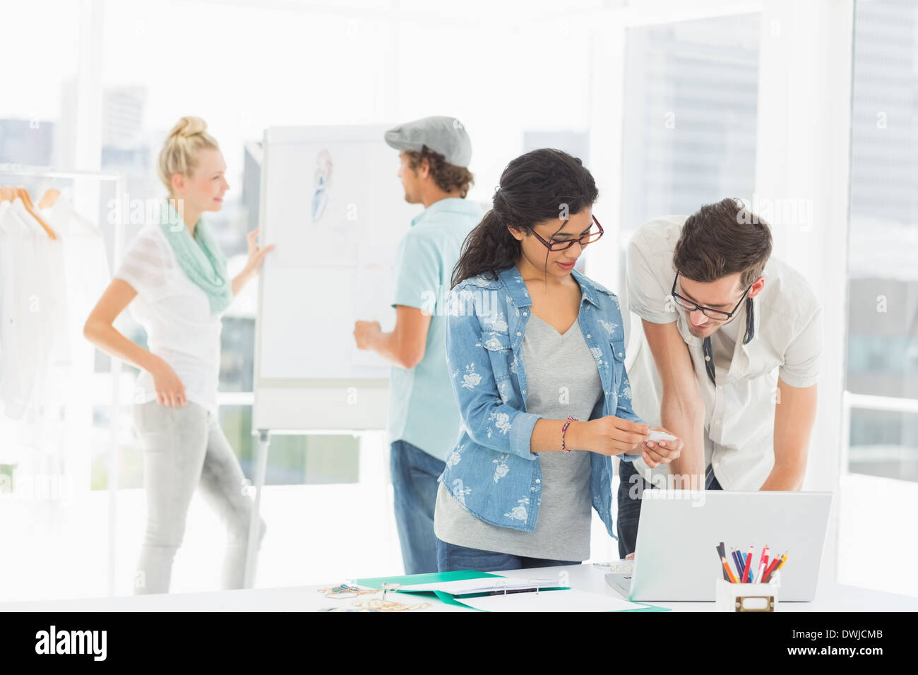 Fashion designers at work Stock Photo - Alamy