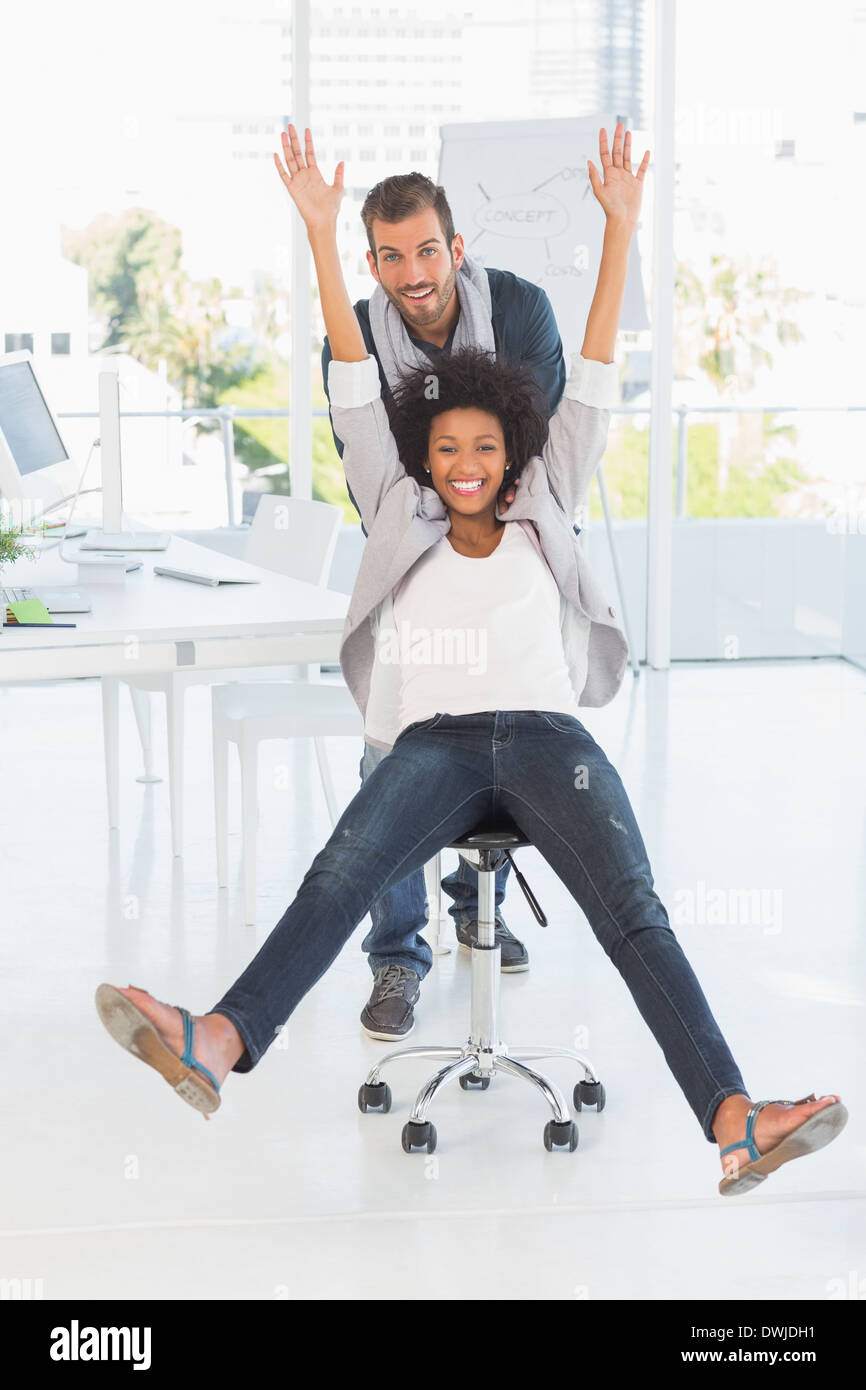 Young woman pushing chair hi-res stock photography and images - Alamy