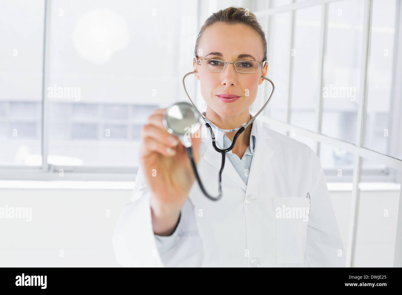 Female doctor with stethoscope in hospital Stock Photo - Alamy