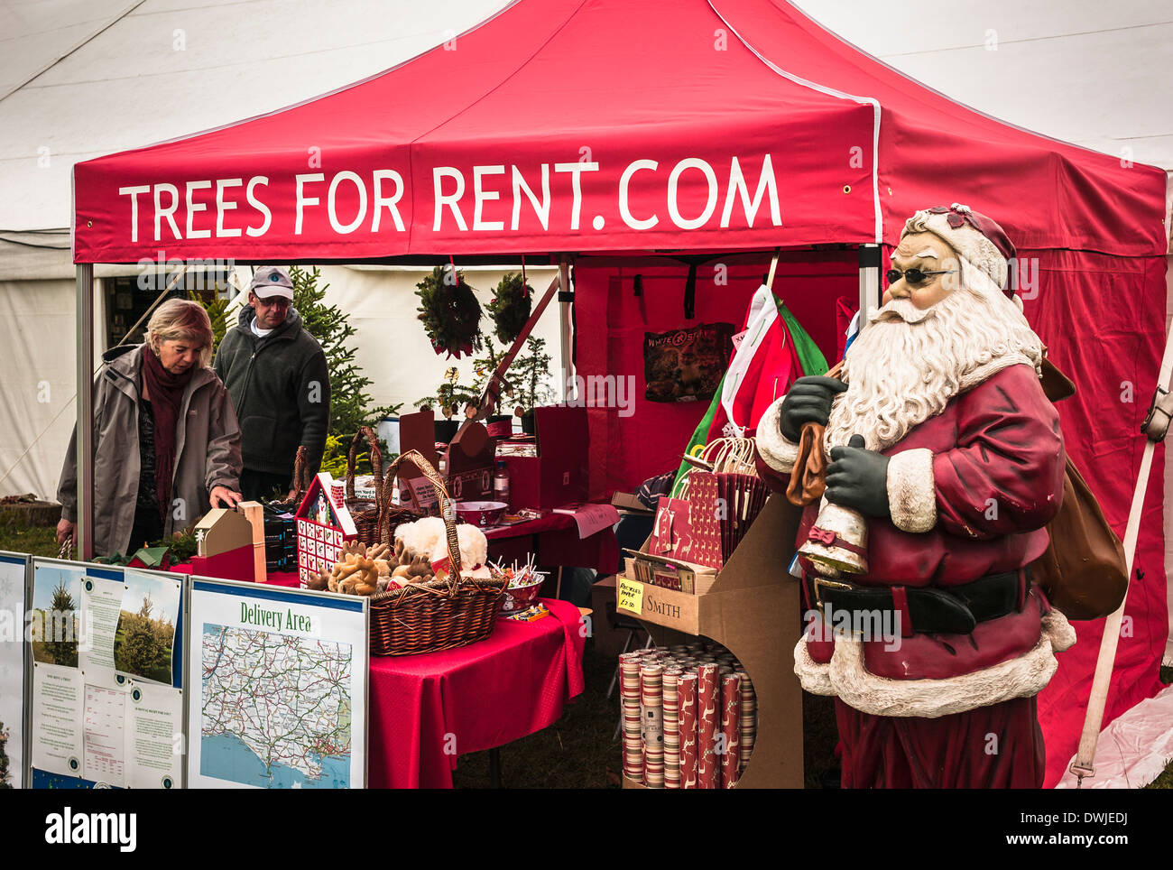 TREES FOR RENT business promotion at outdoor event in UK Stock Photo ...