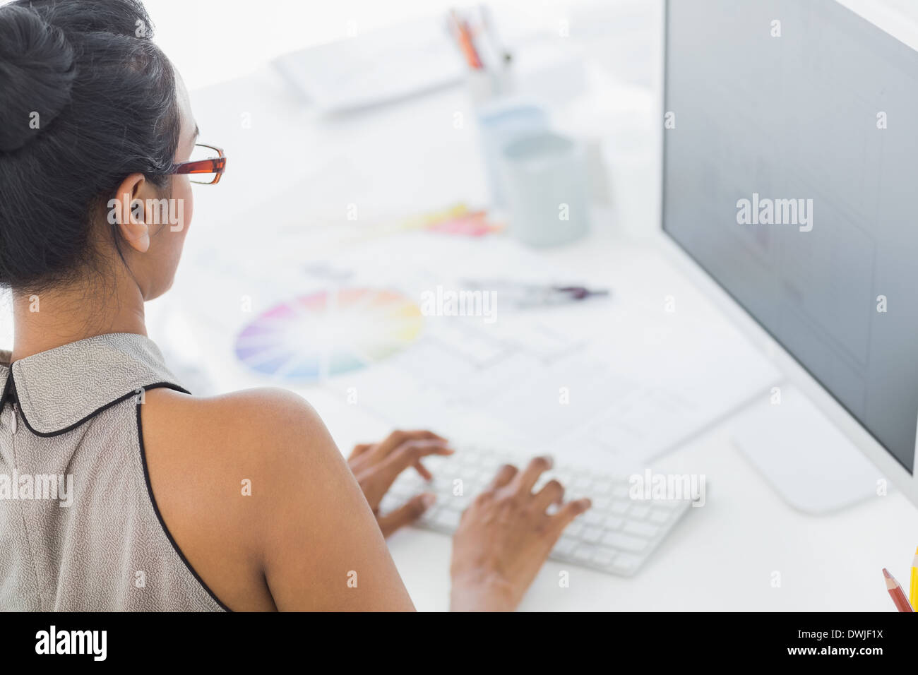 Designer working on her computer Stock Photo - Alamy