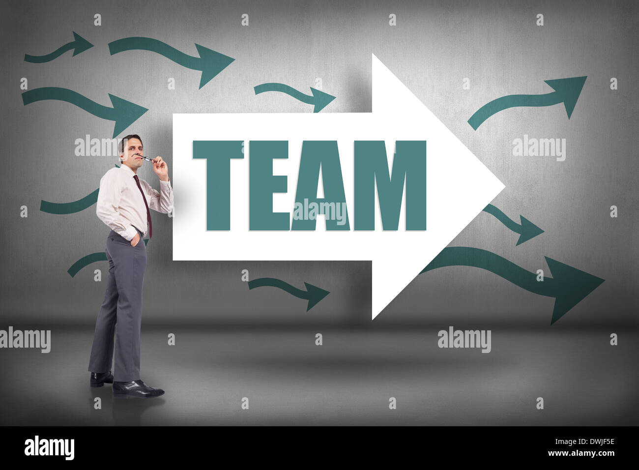 Team against arrows pointing Stock Photo - Alamy