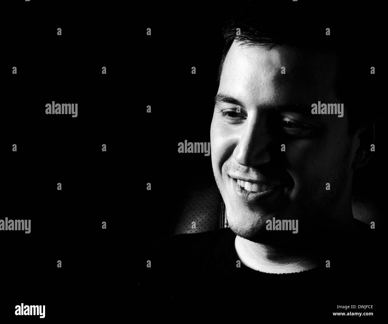 Positive man with smile on his face,low key and b&w technique Stock ...