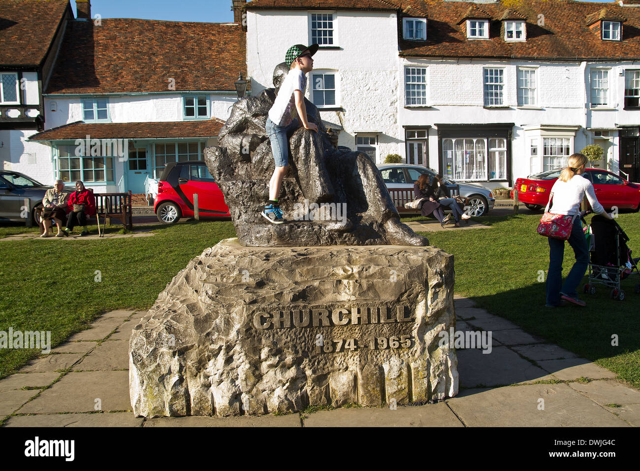 Child climbing Winston Churchill statue in Westerham Kent Stock Photo ...