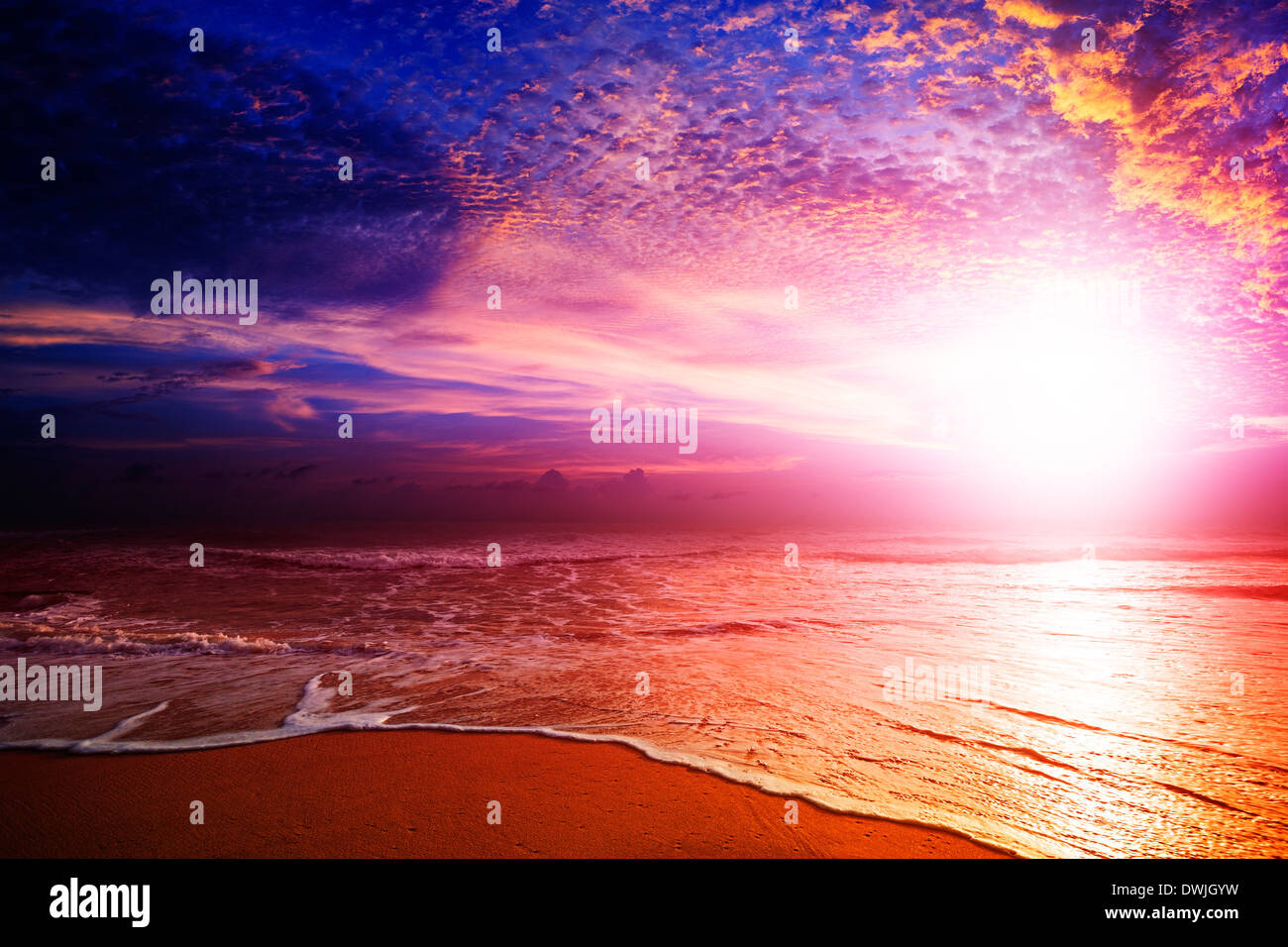Amazing sunset over the beach. HDR processed Stock Photo - Alamy