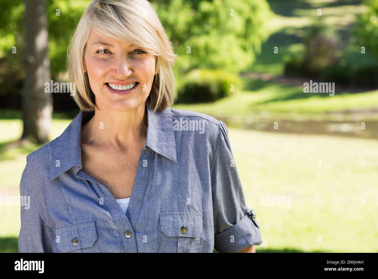 Beautiful woman in park Stock Photo - Alamy