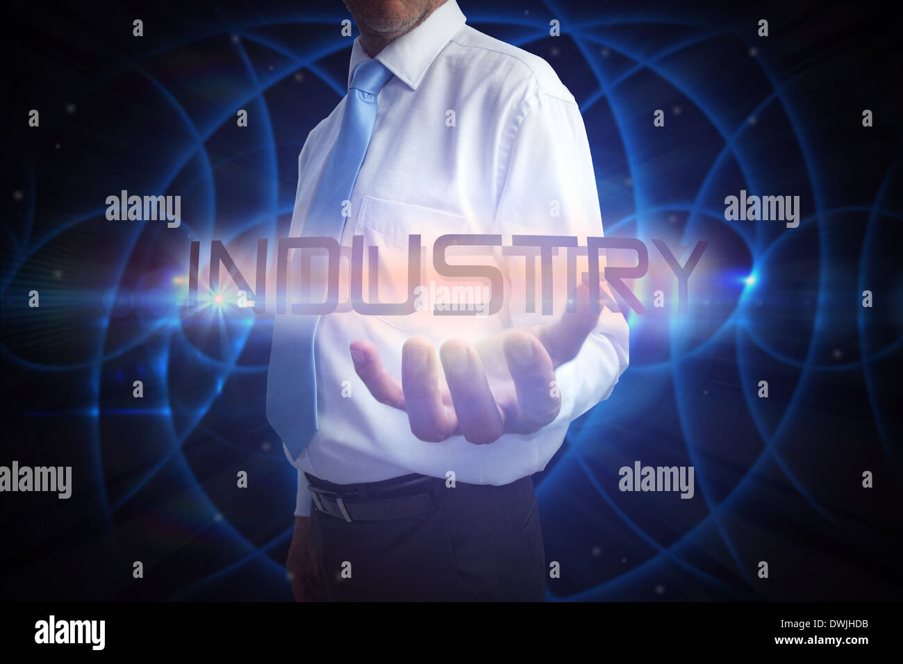 Businessman presenting the word industry Stock Photo - Alamy