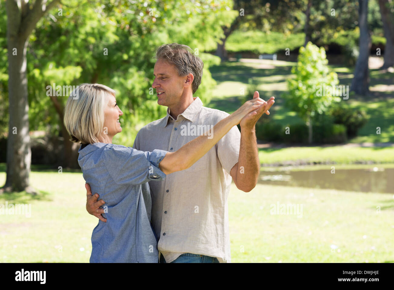 Couple dancing in countryside Stock Photo - Alamy