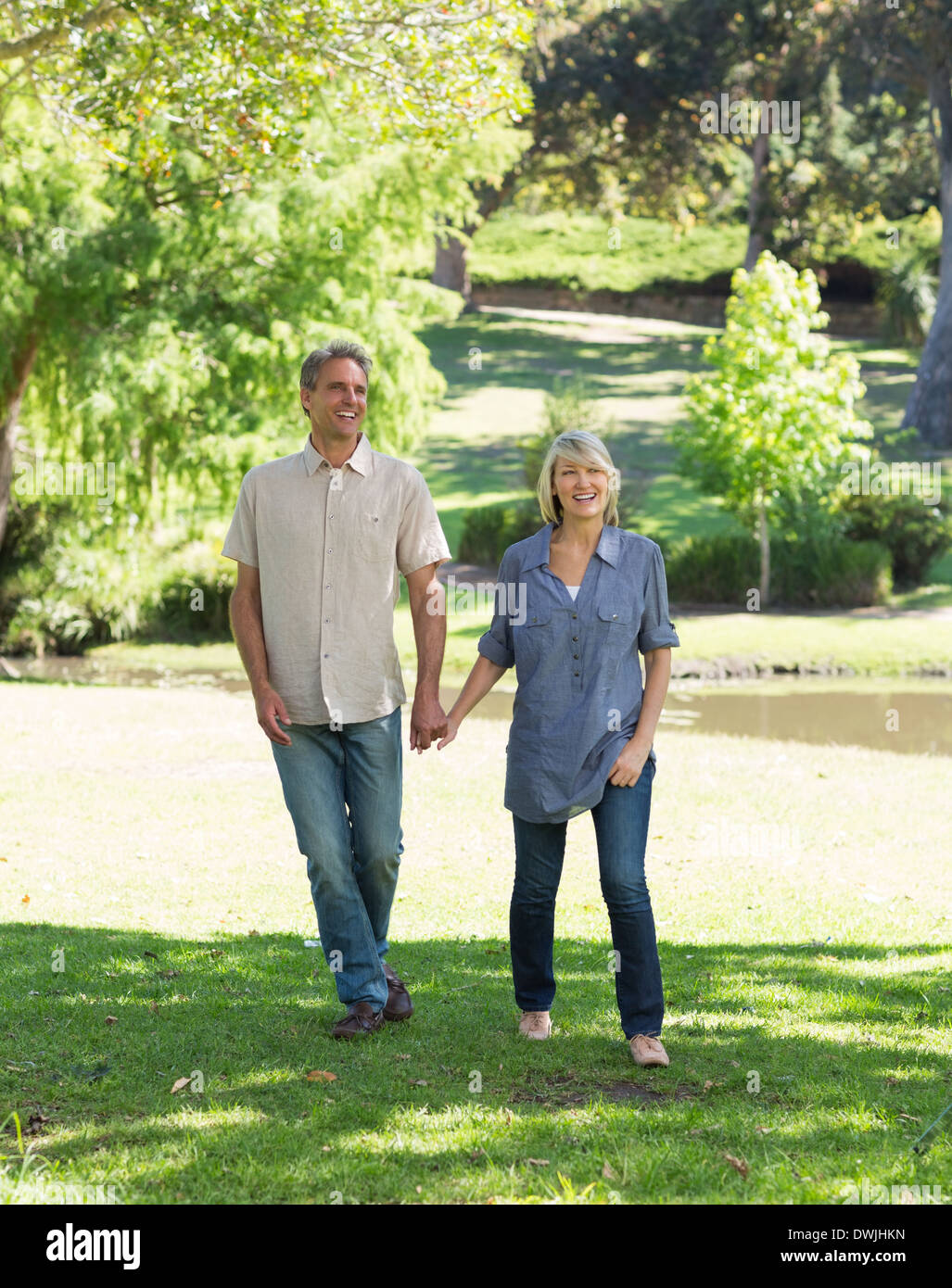 Walking holding looking away tree hi-res stock photography and images ...