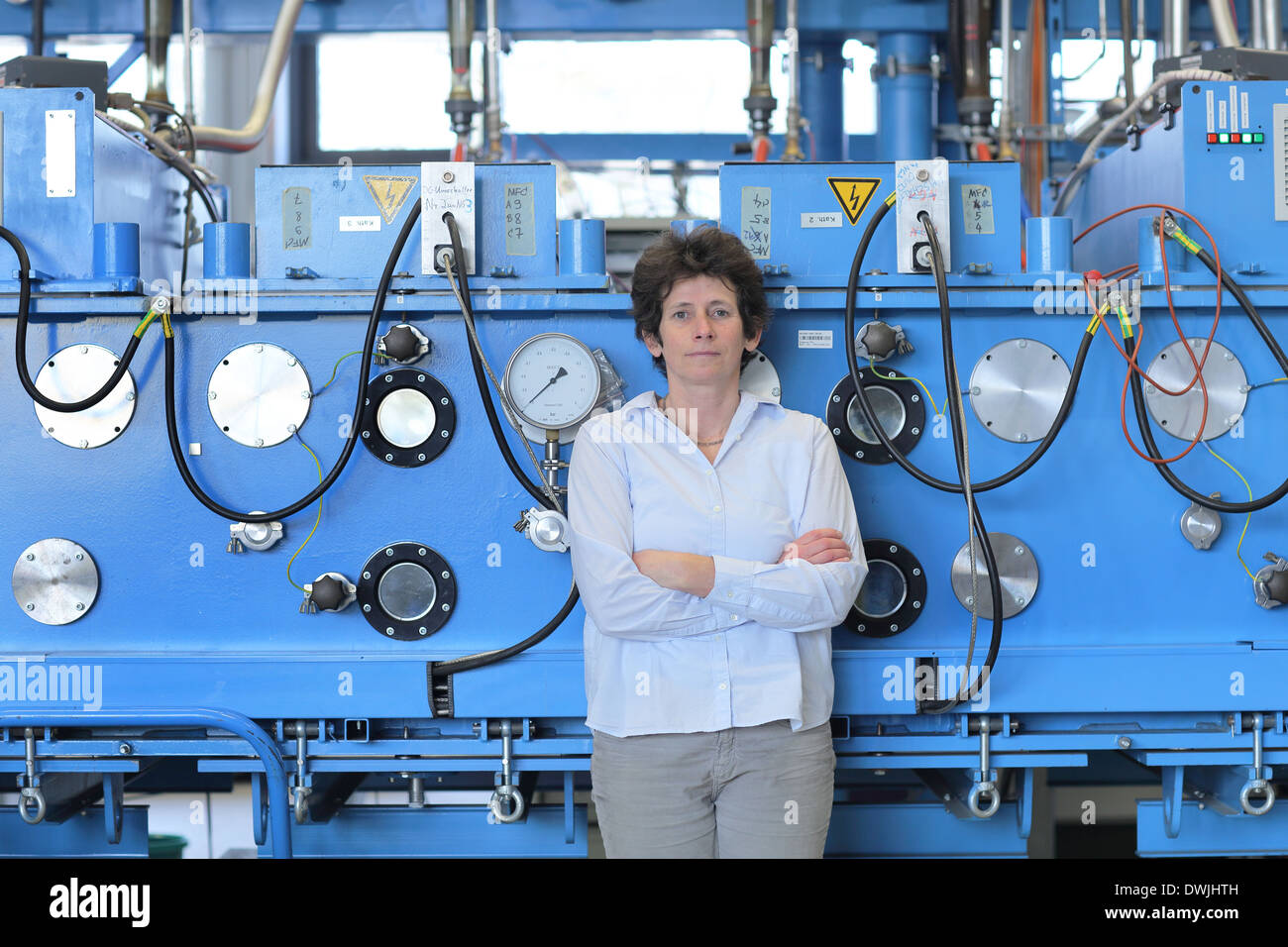 scientist technical person woman middle age working in a technical lab ...