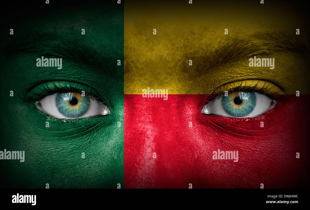 Human face painted with flag of Benin Stock Photo - Alamy