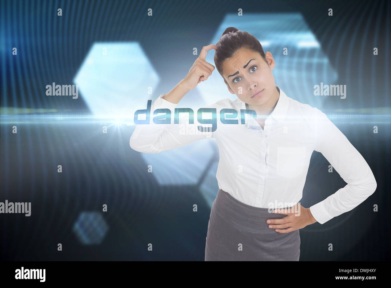 Danger against shiny hexagons on black background Stock Photo - Alamy