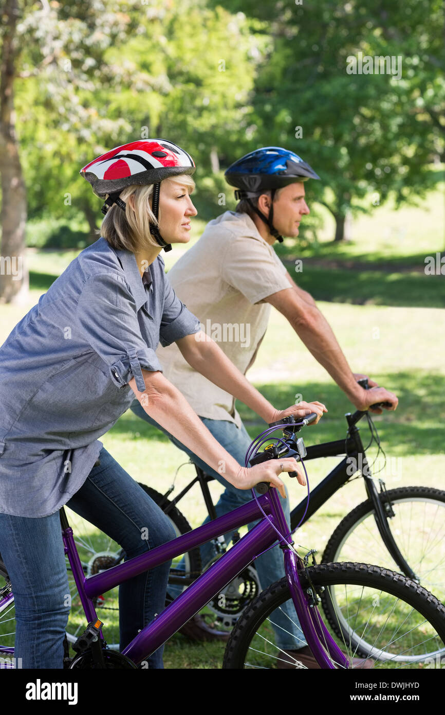 Couple riding cycles hi-res stock photography and images - Alamy