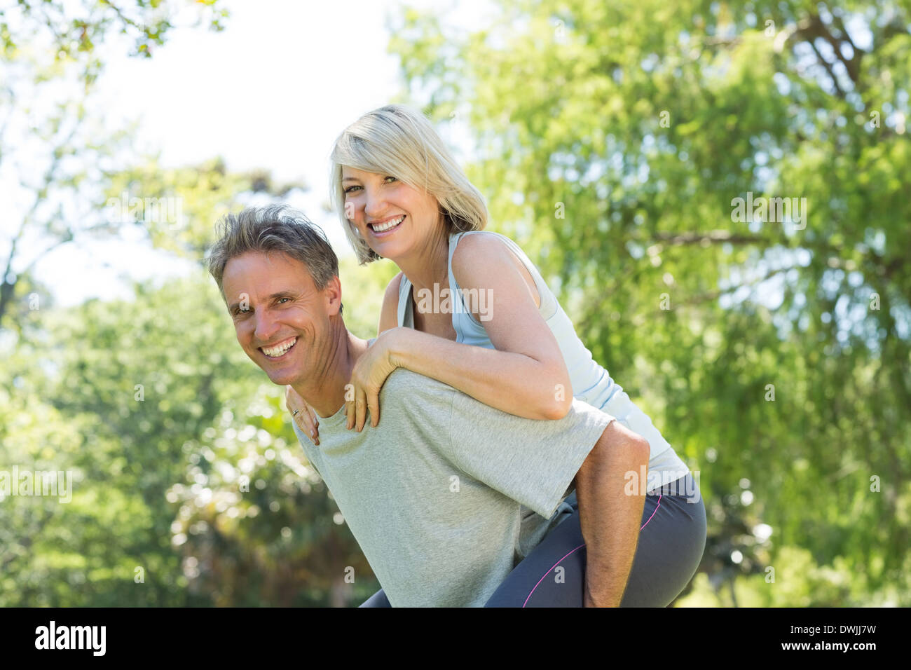 Couple playing piggyback ride in hi-res stock photography and images ...