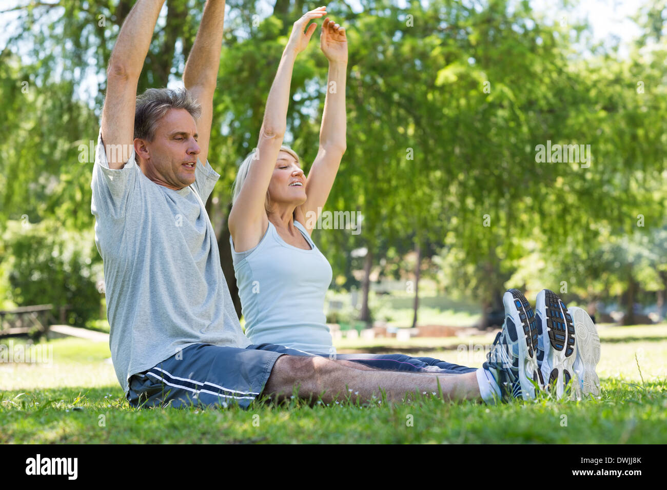 Couple exercising park hi-res stock photography and images - Alamy