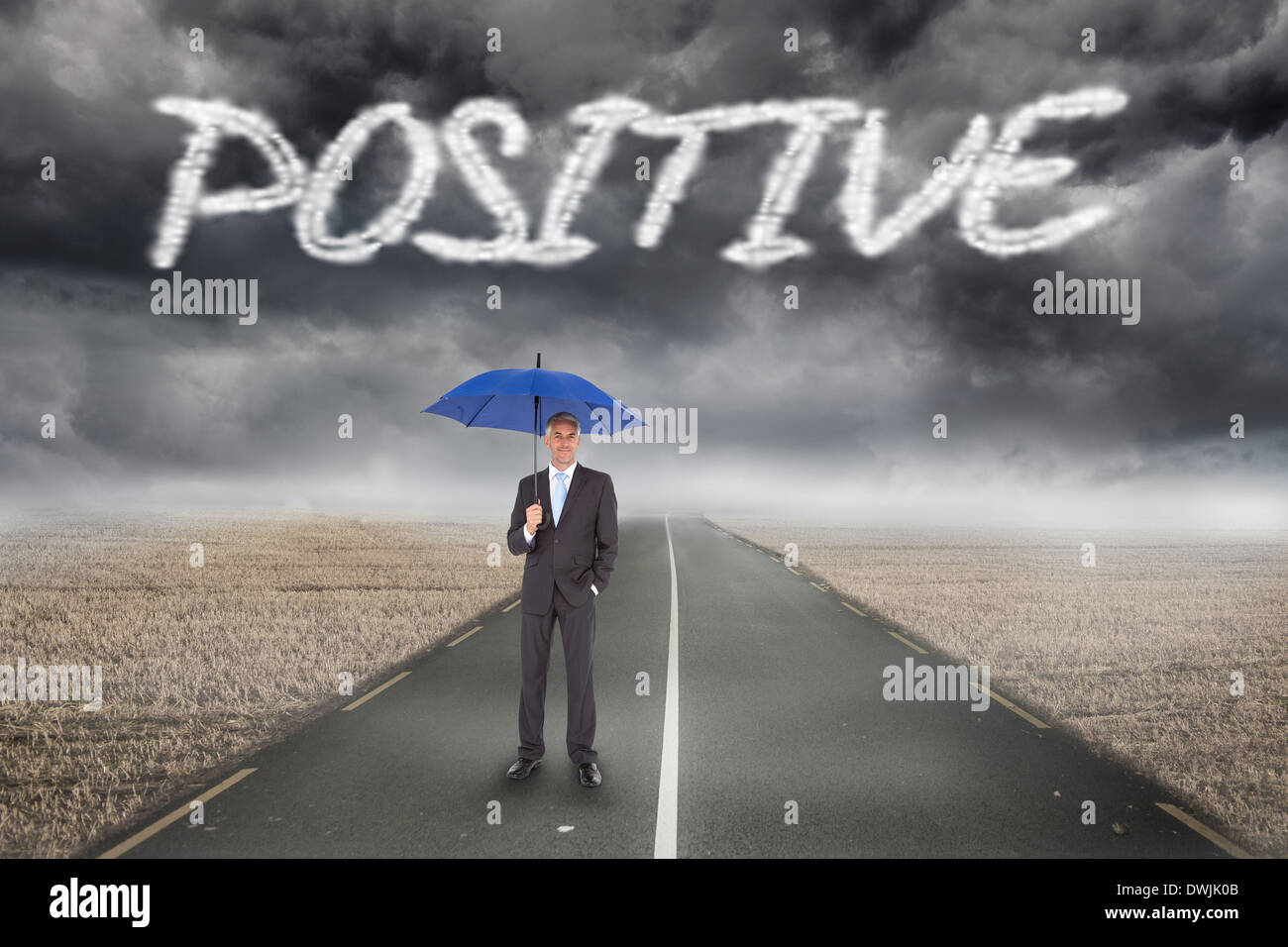 Positive against misty brown landscape with street Stock Photo - Alamy