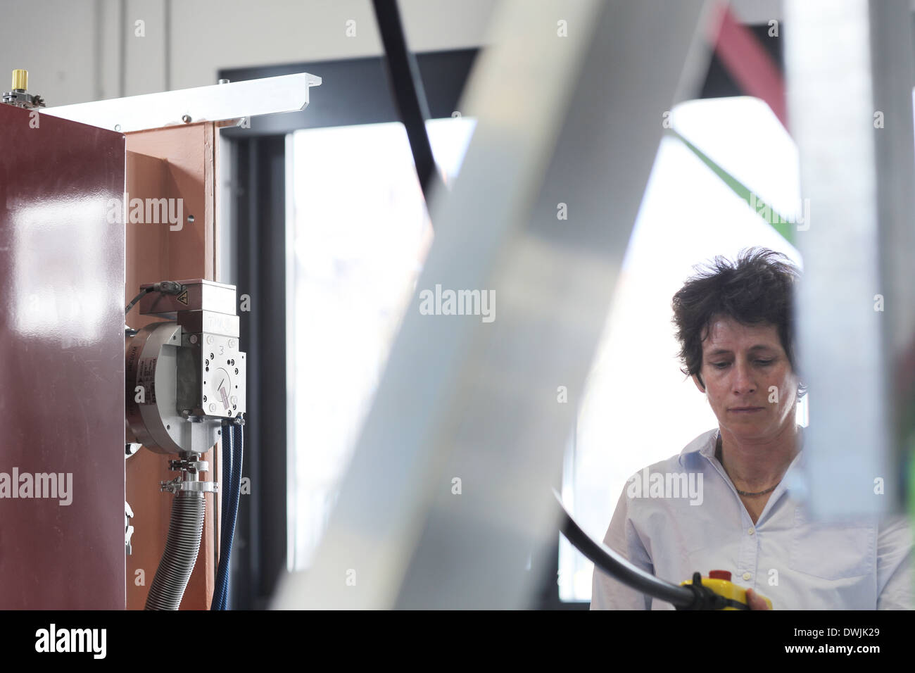 scientist technical person woman middle age working in a technical lab ...