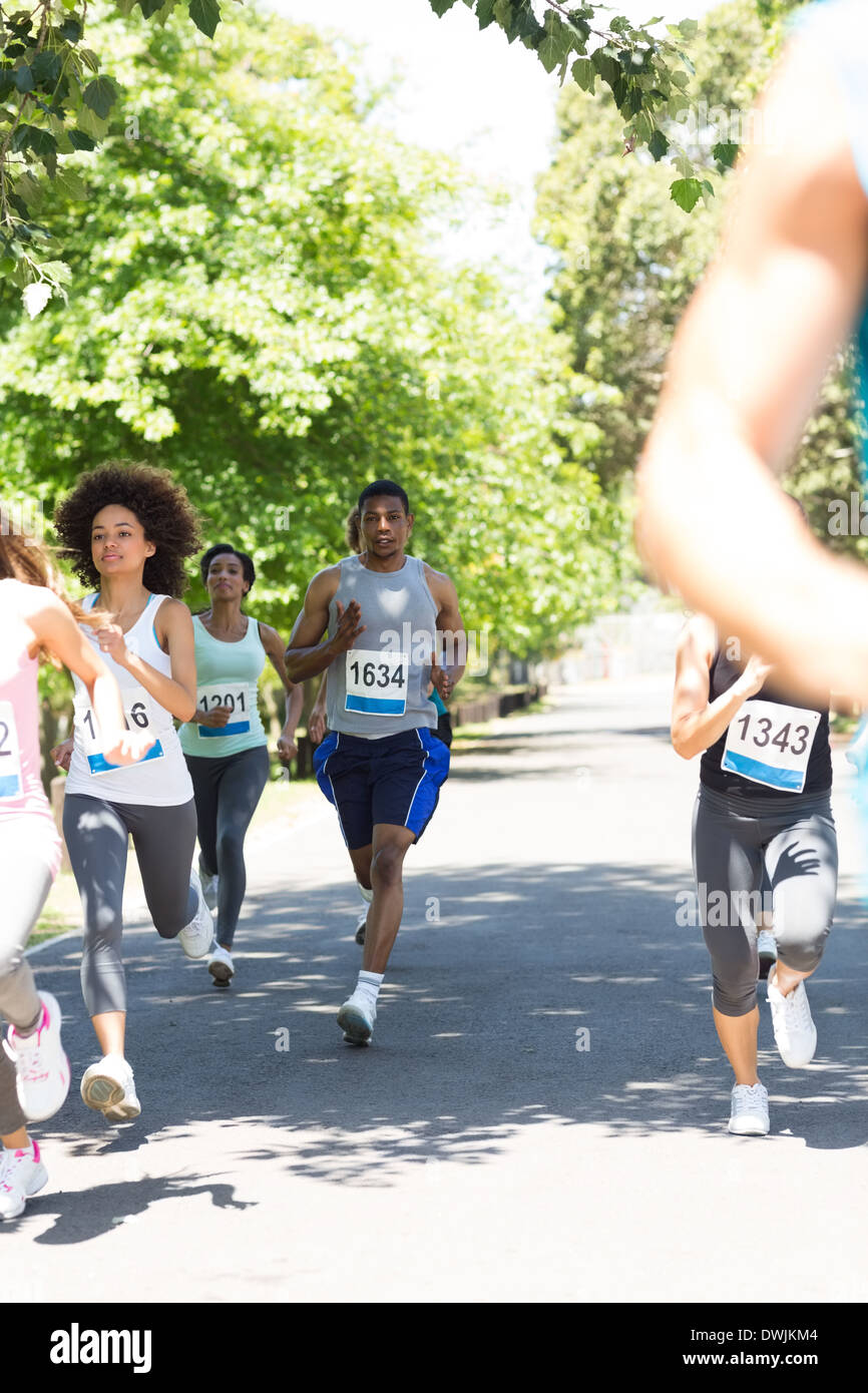 Runners racing in marathon Stock Photo - Alamy