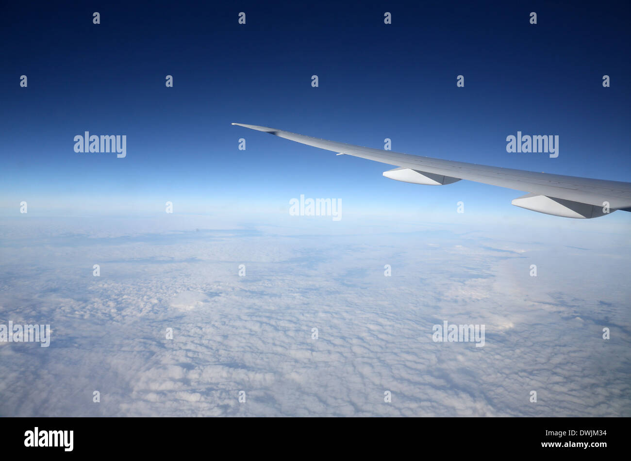 Wing of airplane from window Stock Photo - Alamy