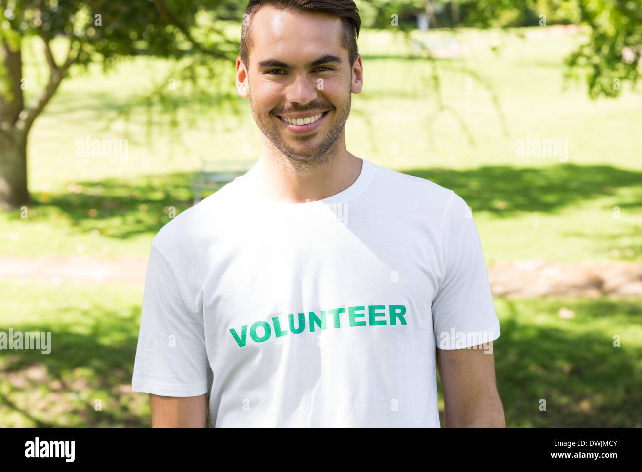 Male volunteer in park hi-res stock photography and images - Alamy