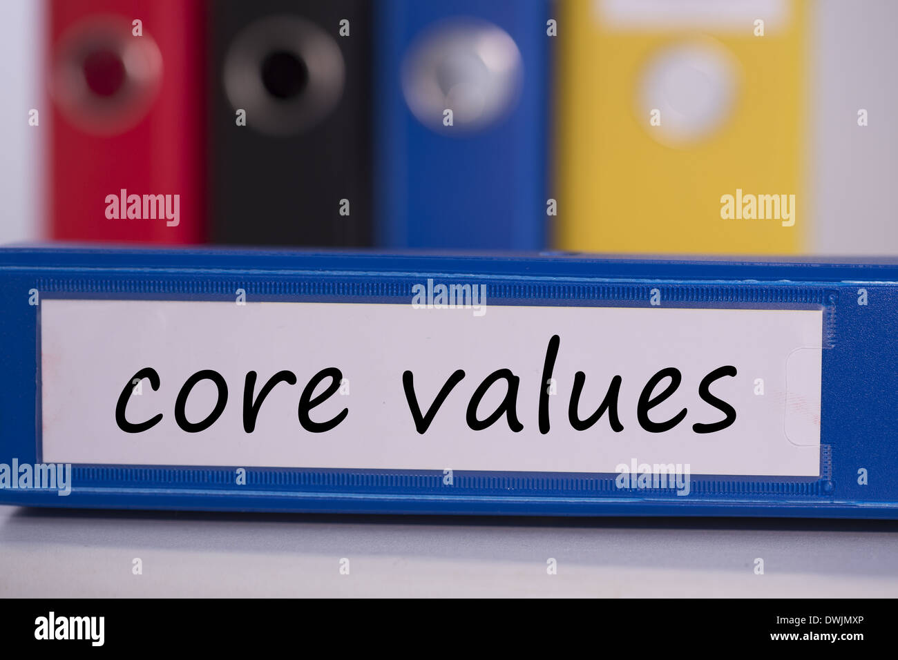 Core values on blue business binder Stock Photo - Alamy