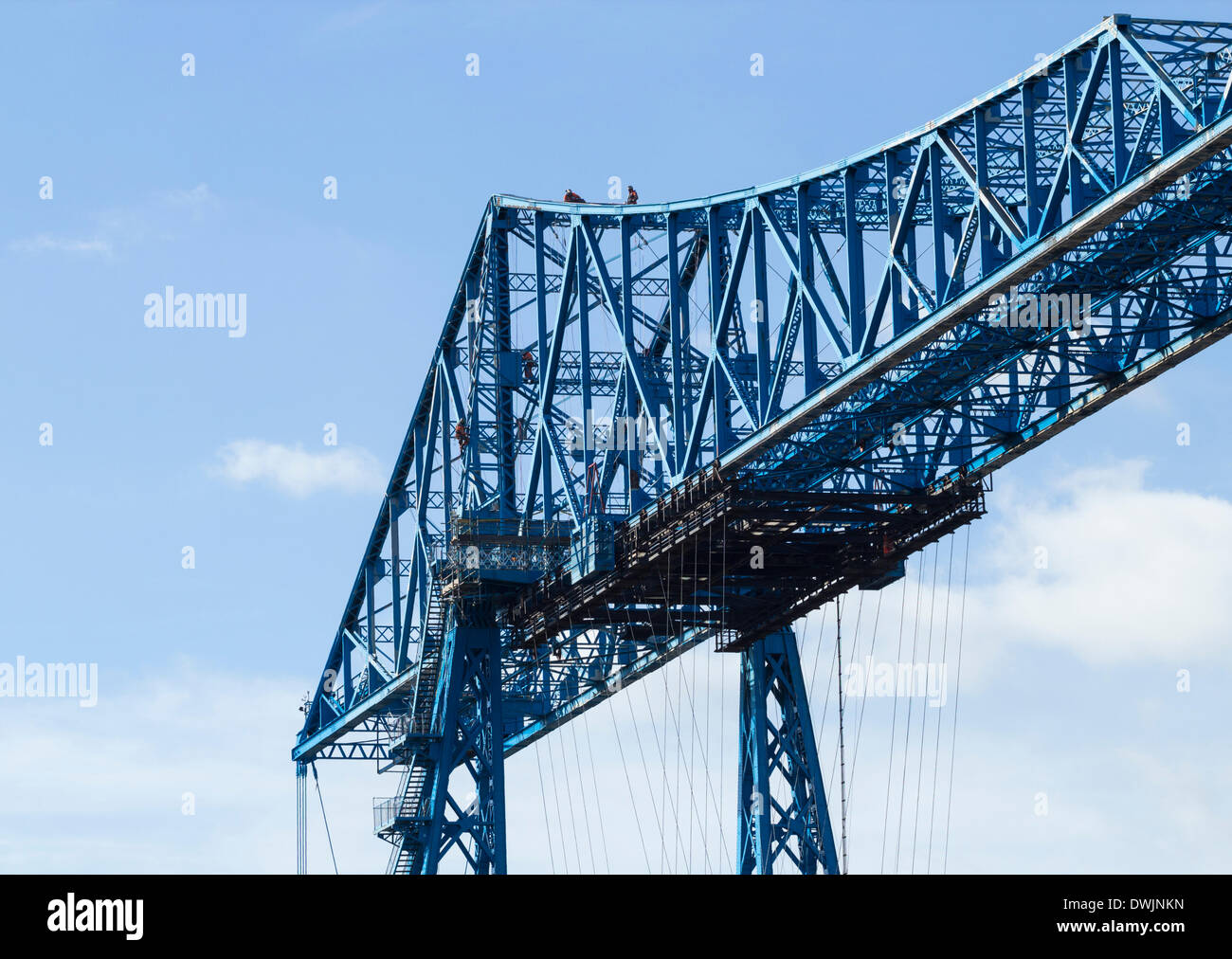 Workmen painting the transporter bridge over the river tees at ...