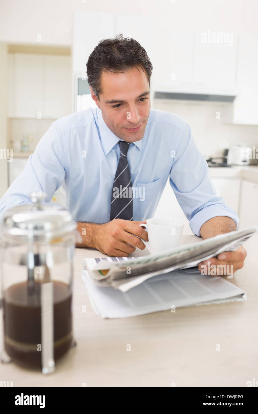 Smart dressed man sitting down hi-res stock photography and images - Alamy