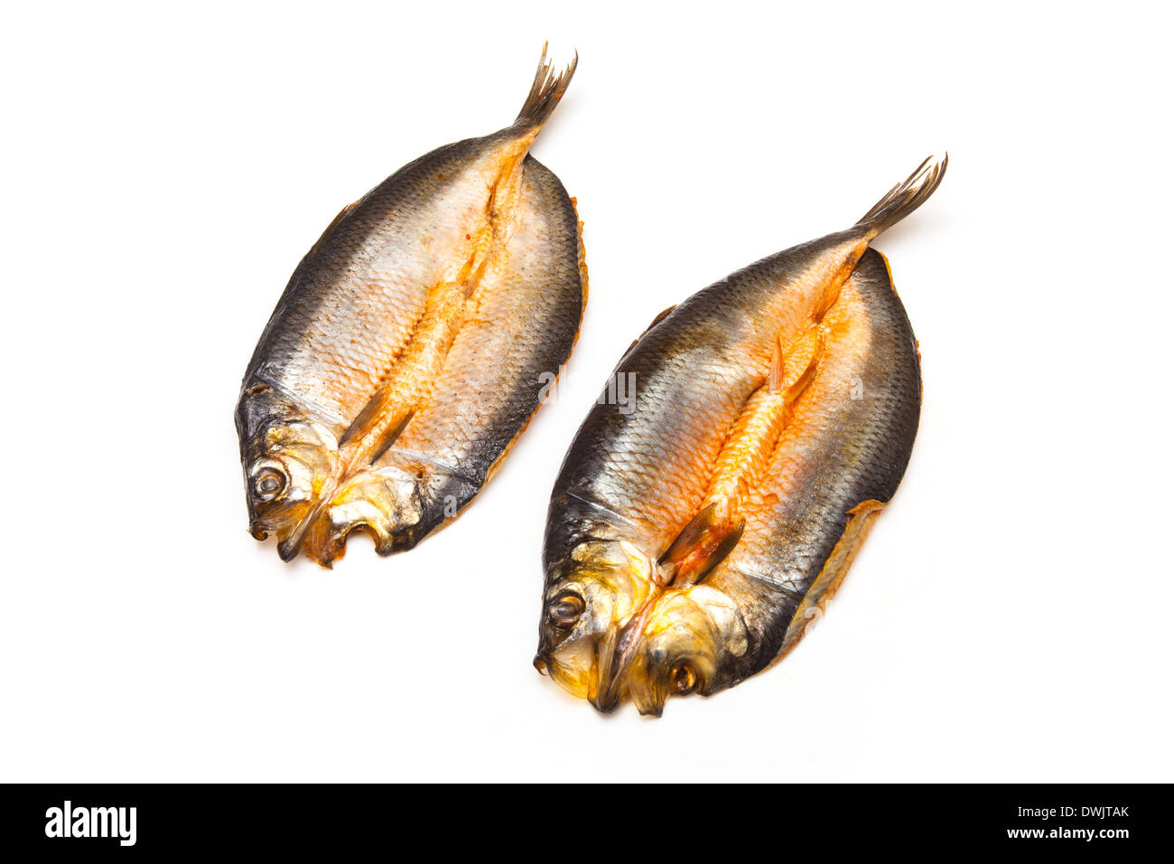 Kippers isolated on a white studio background Stock Photo - Alamy