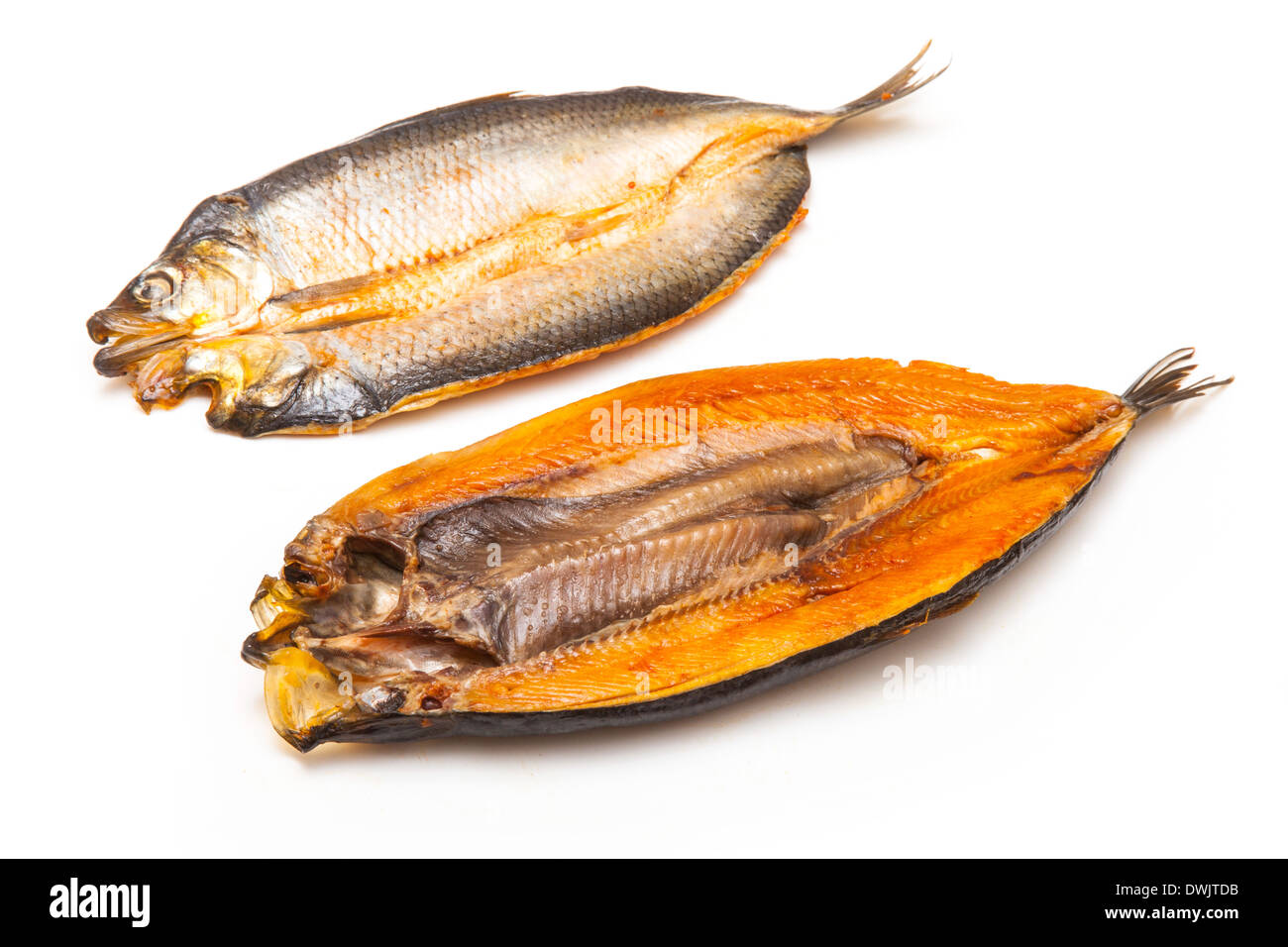 Kippers isolated on a white studio background Stock Photo - Alamy