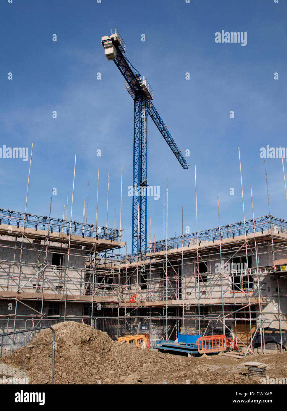Tower crane over a building site, Building new retirement apartments ...