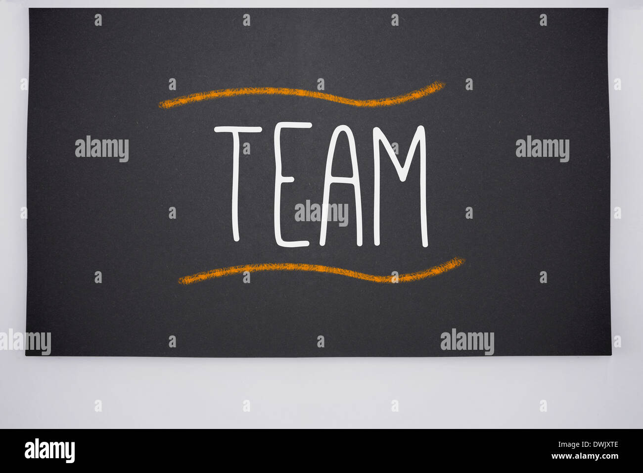 Team written on big blackboard Stock Photo - Alamy