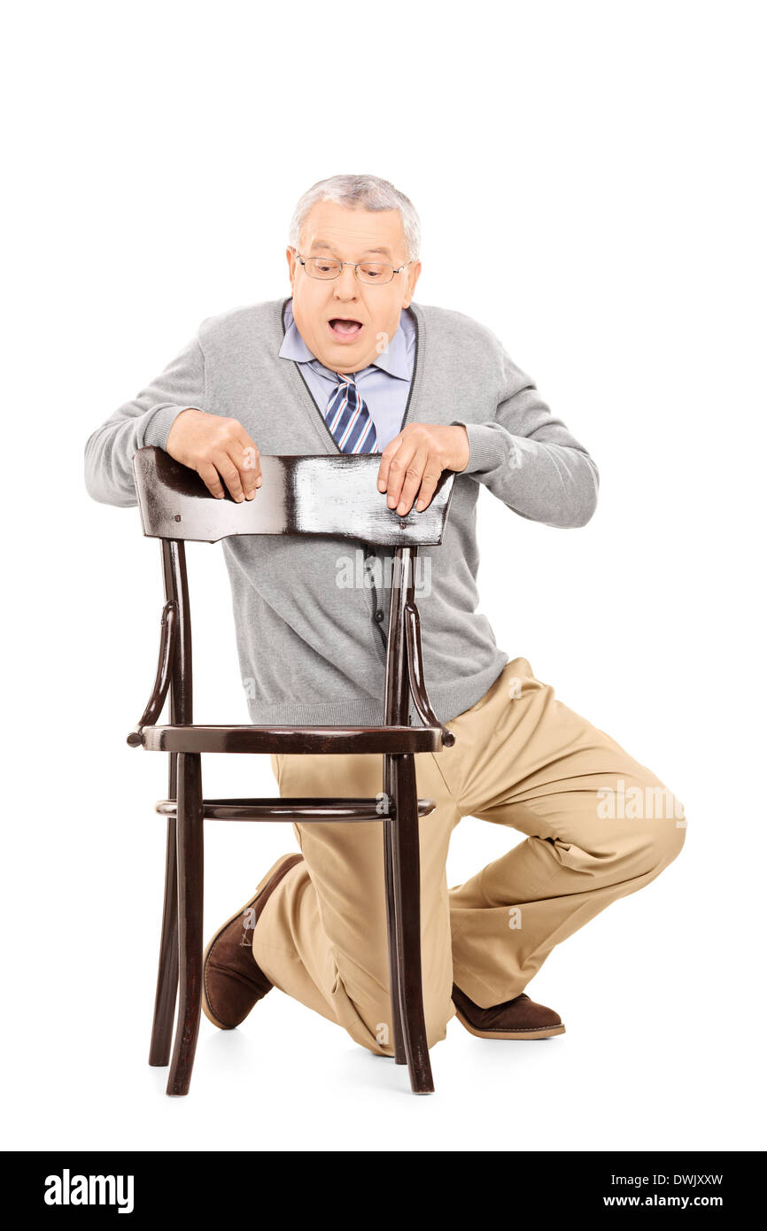 Senior male behind chair Cut Out Stock Images & Pictures - Alamy