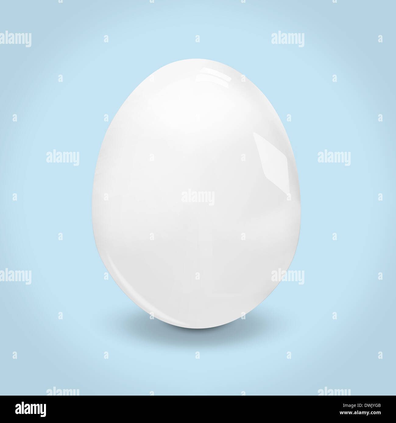 white glossy shiny egg on light blue background Stock Photo - Alamy