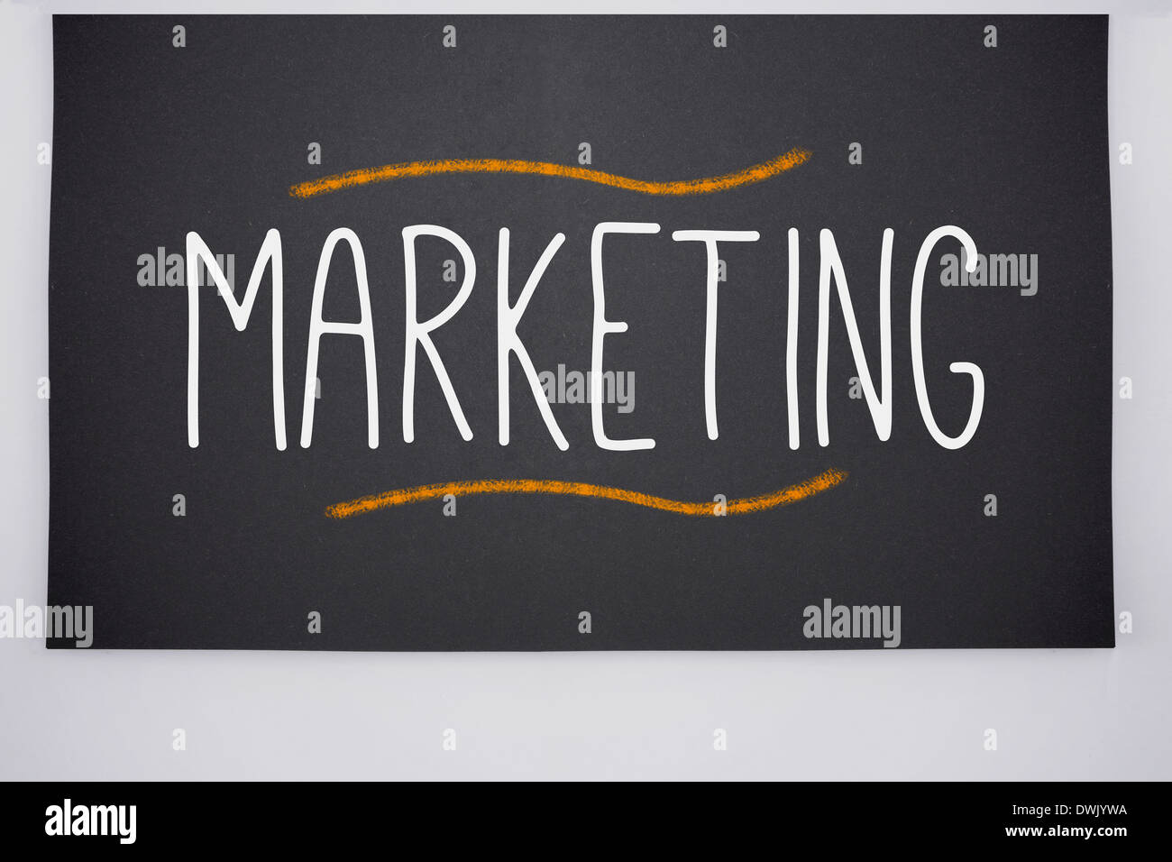 Marketing written on big blackboard Stock Photo - Alamy