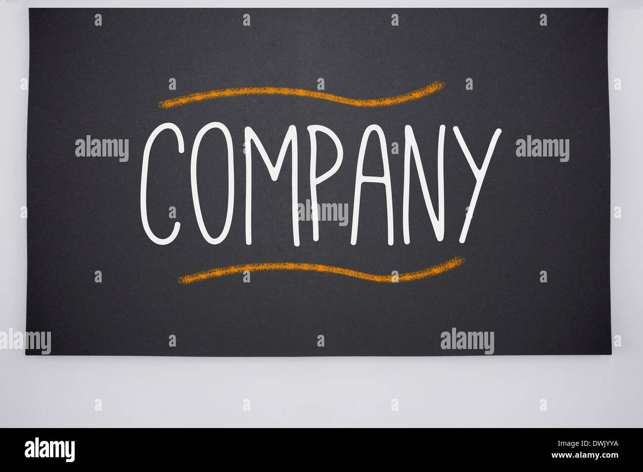 Company written on big blackboard Stock Photo - Alamy
