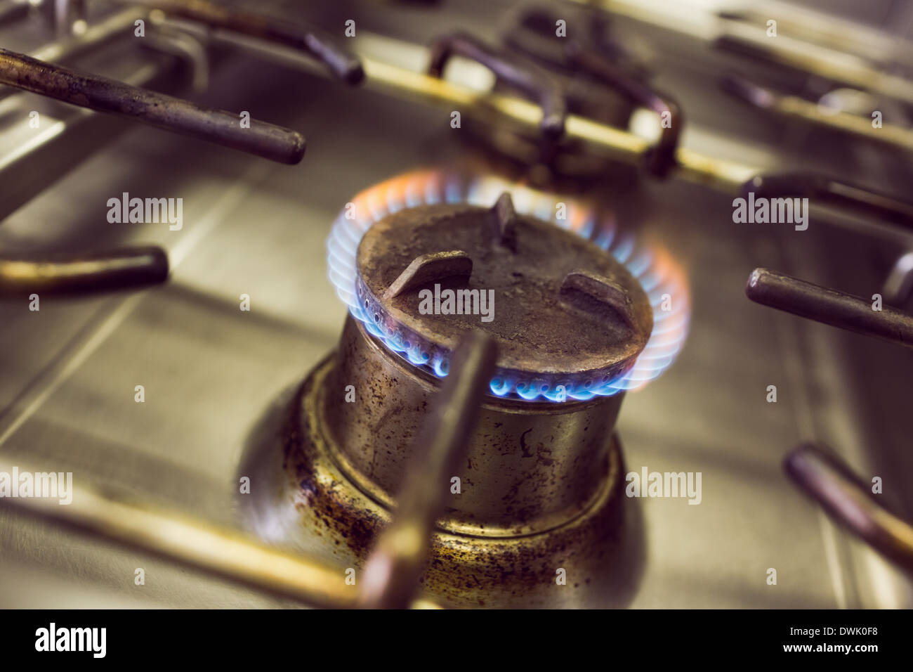 Burning gas on kitchen gas stove Stock Photo - Alamy