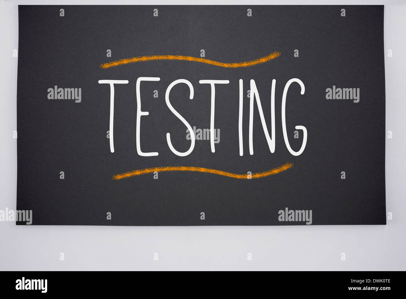 Testing written on big blackboard Stock Photo - Alamy