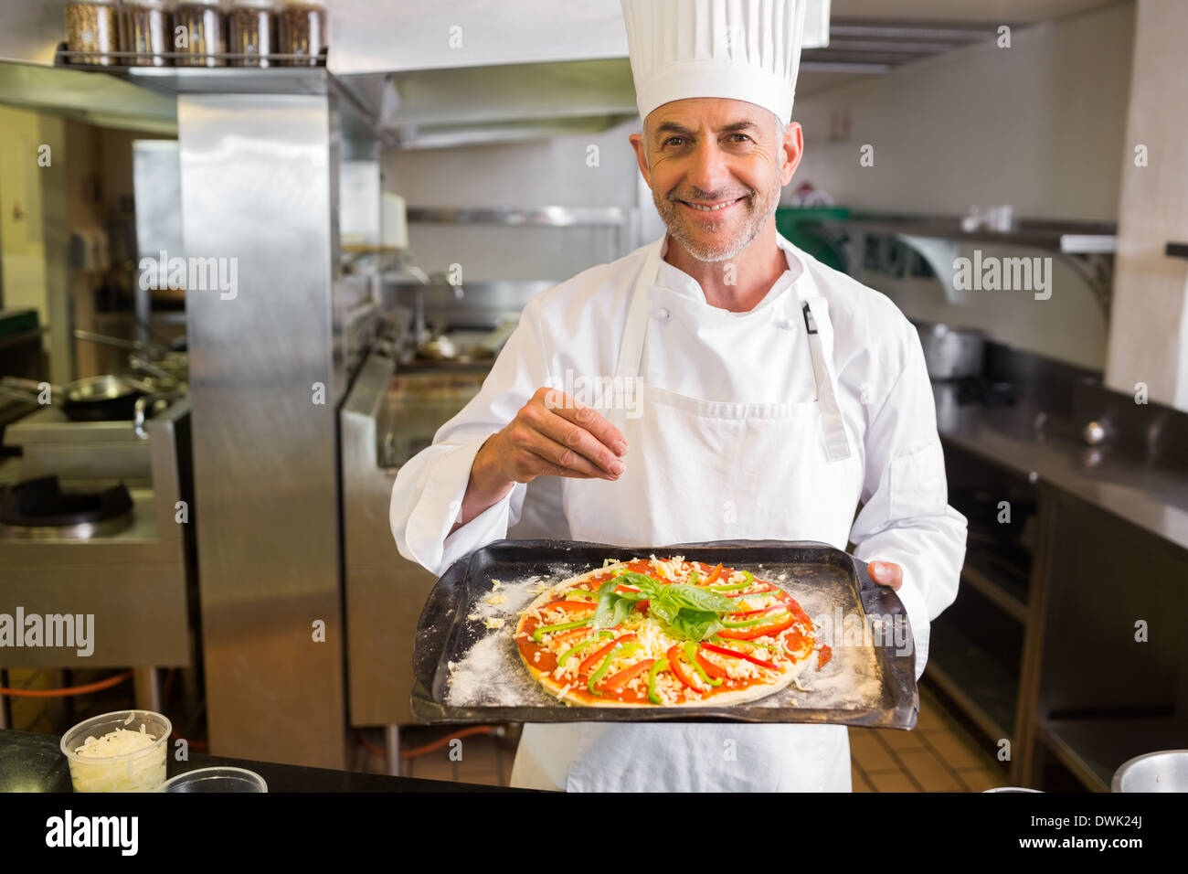 Mature male chef holding tray hi-res stock photography and images - Alamy